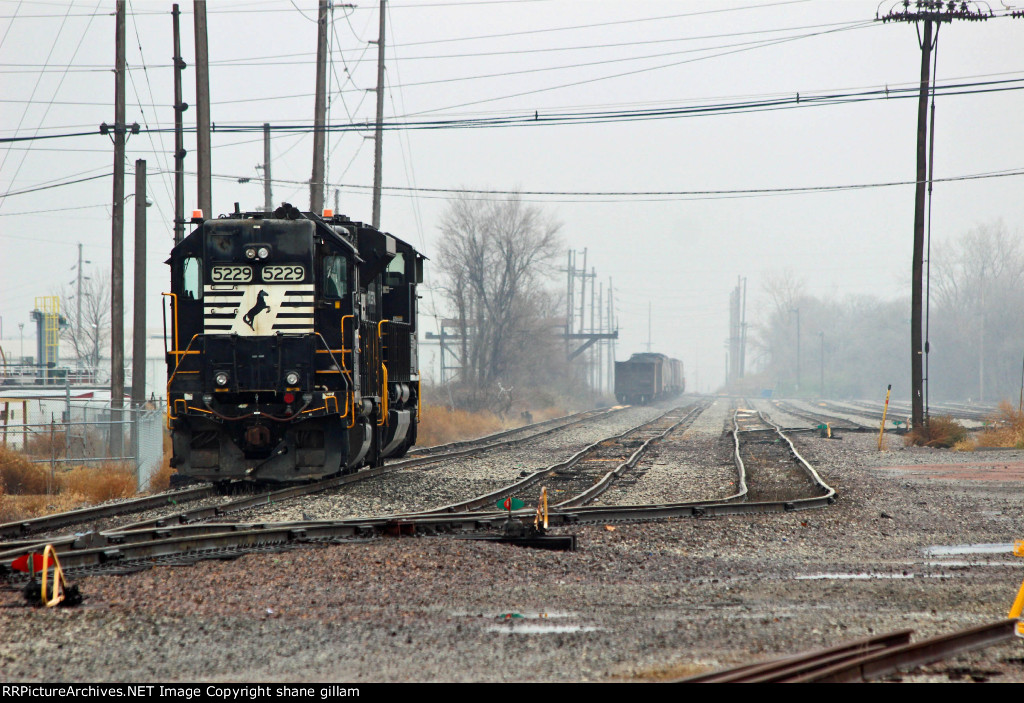 NS 5229 is hooked up with NS penn central unit.